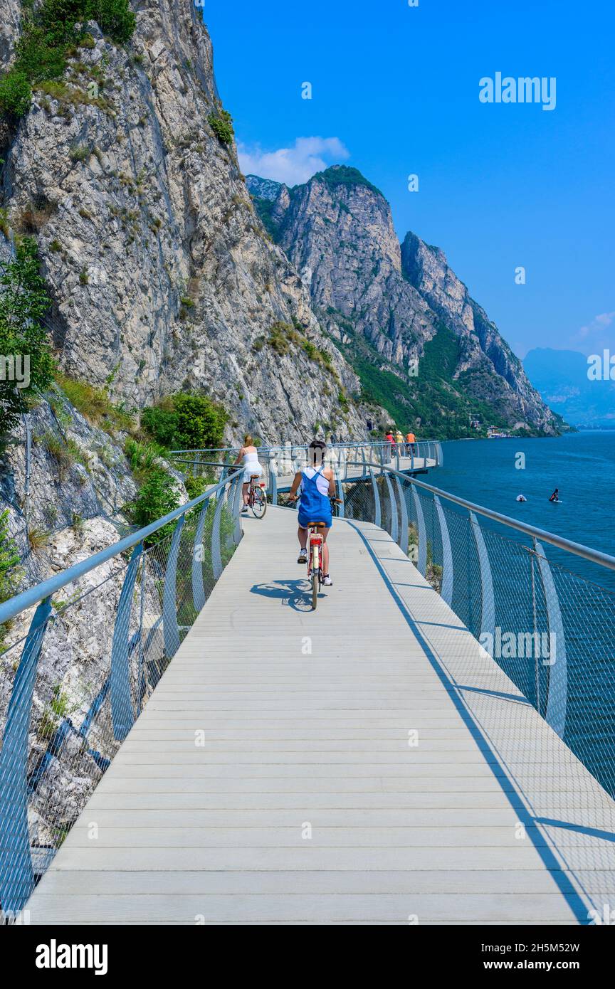 Ciclopista del Garda - Bicycle road and foot path over Garda lake with ...