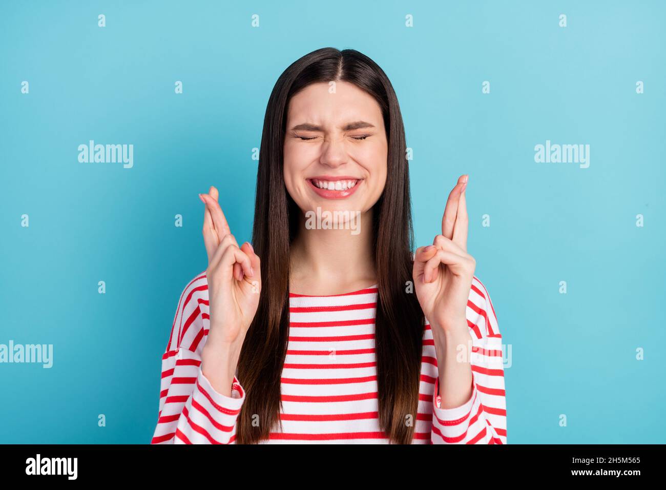 Portrait of attractive focused cheerful girlish girl waiting gift ...