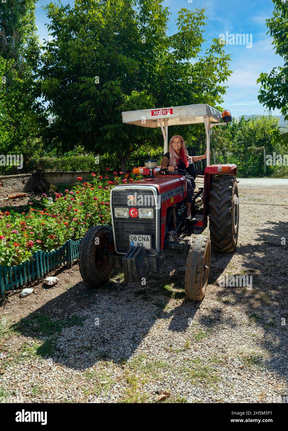 Ankara, Turkey- September 18 2021: Woman driving tractor Stock Photo ...