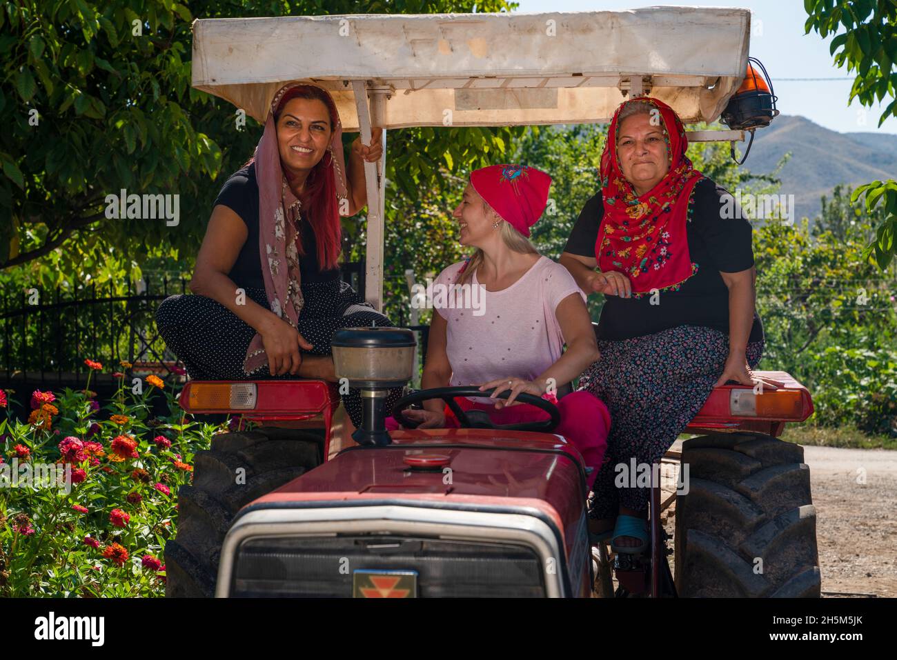 Woman driving tractor hi-res stock photography and images - Alamy