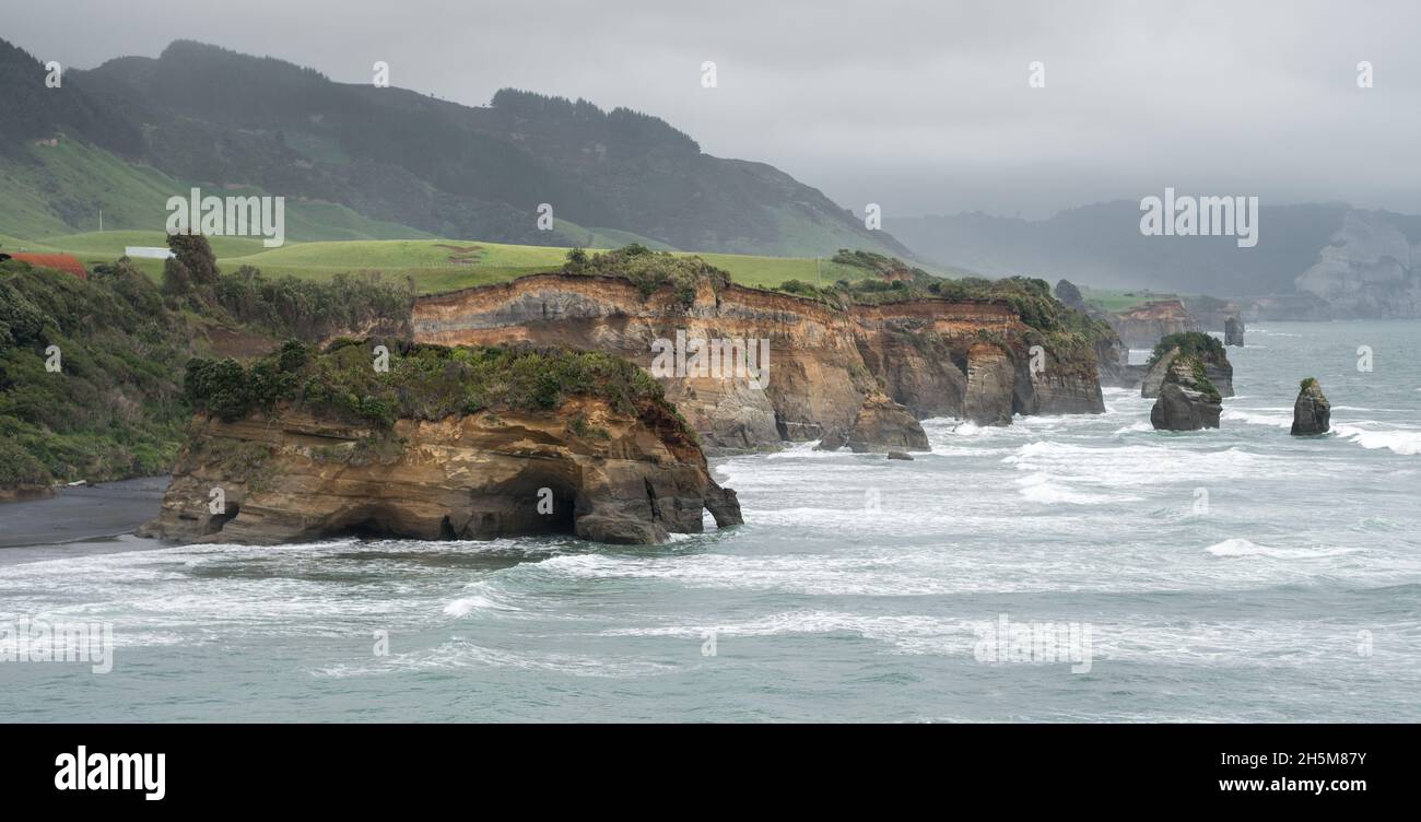 Three sisters cliffs New zealand Stock Photo - Alamy