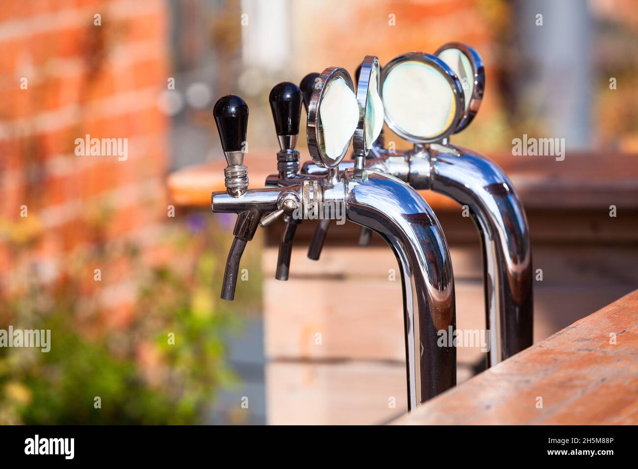 Outdoor tap on brick wall hi-res stock photography and images - Alamy
