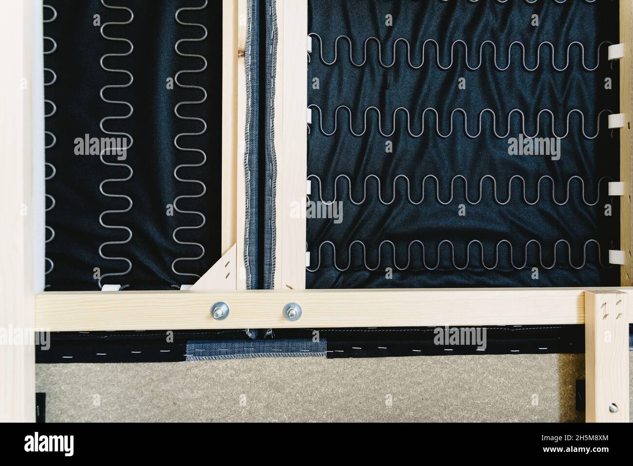 Detail of the inside of a sofa, with springs that hold the structure ...