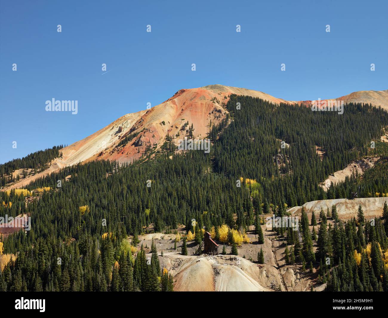 Vivid fall colors accent the aptly named Red Mountainbetween Ouray and ...