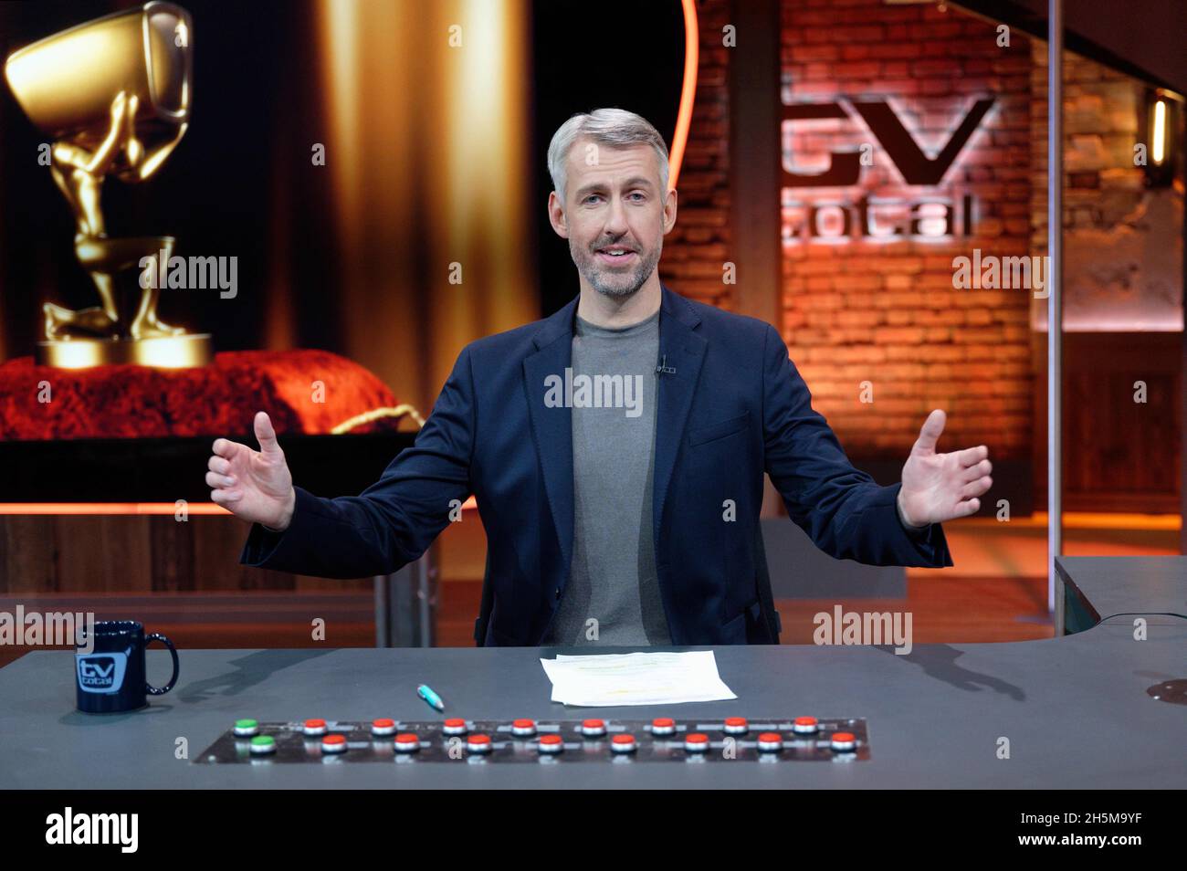 Cologne, Germany. 10th Nov, 2021. Entertainer Sebastian Pufpaff sits in ...