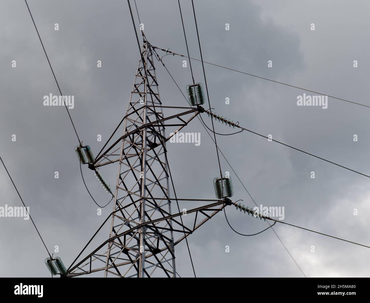 Low-angle shot of a dead-end tower or anchor pylon against a gray ...