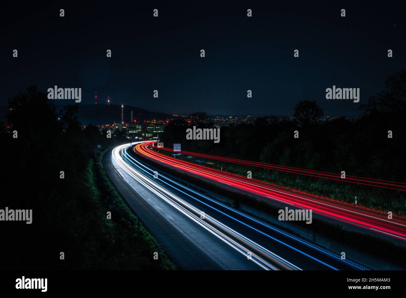 Beautiful horizontal background of a road light trail; long-exposure ...