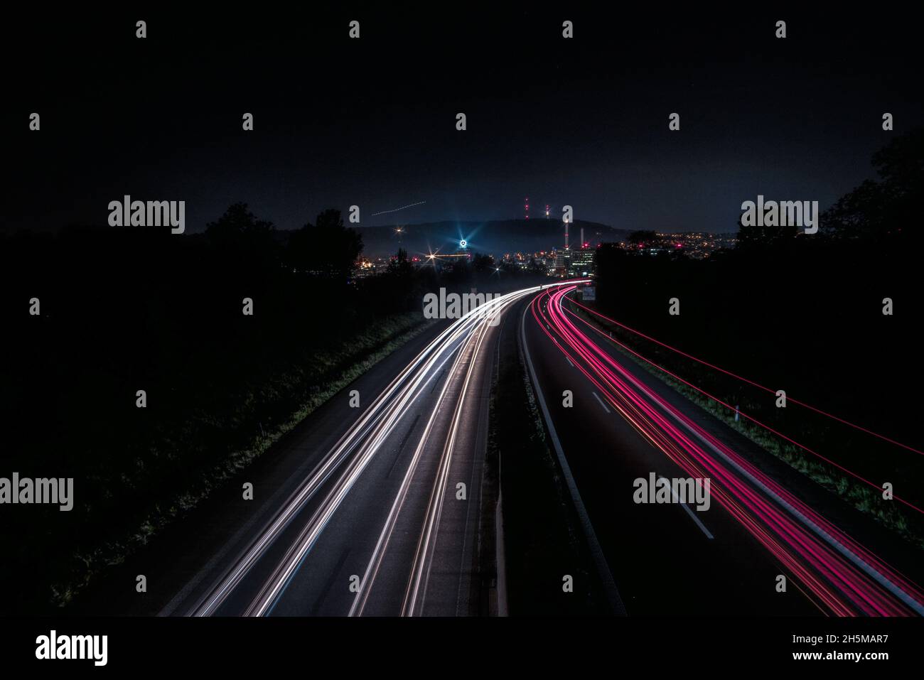 Beautiful horizontal background of a road light trail; long-exposure ...