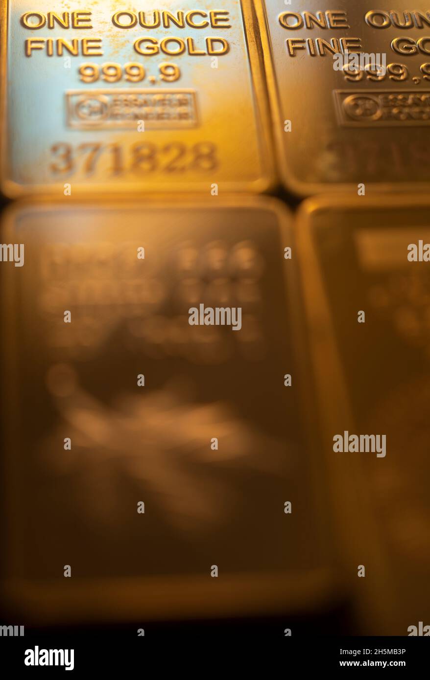 Solid pure 999.9 gold bullion ingot bars photo Stock Photo - Alamy