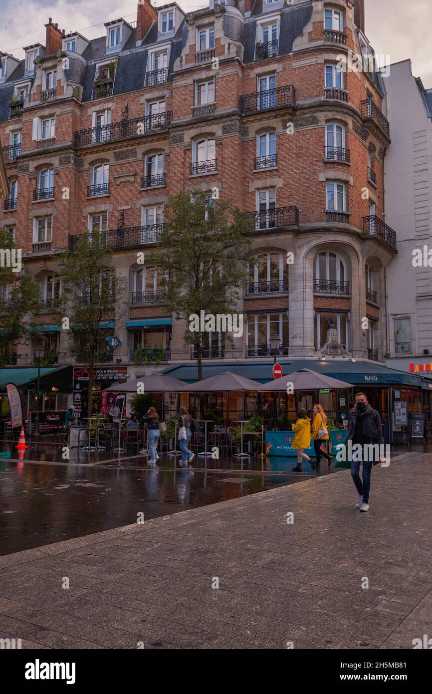 Traditional Parisian Residential Buildings in a Small Street with Cafés ...