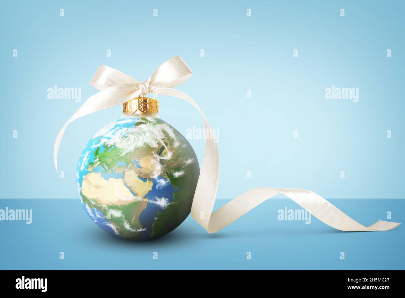 Beautiful balls with planet Earth on blue background Stock Photo - Alamy