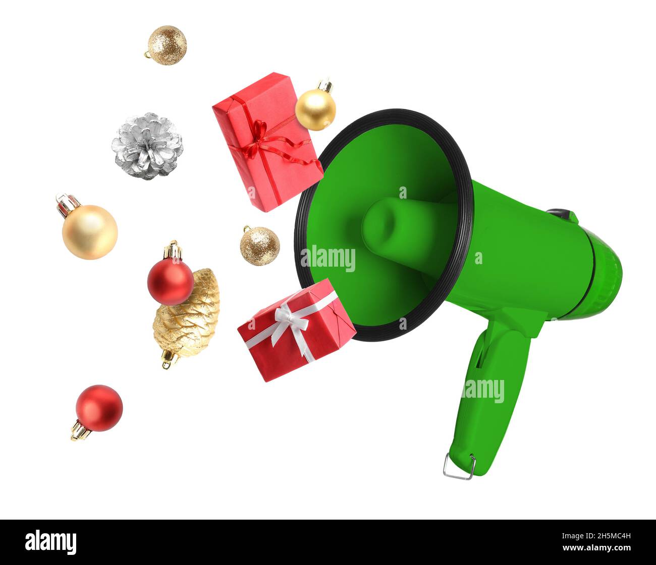 Flying megaphone and Christmas decorations with gifts on white ...