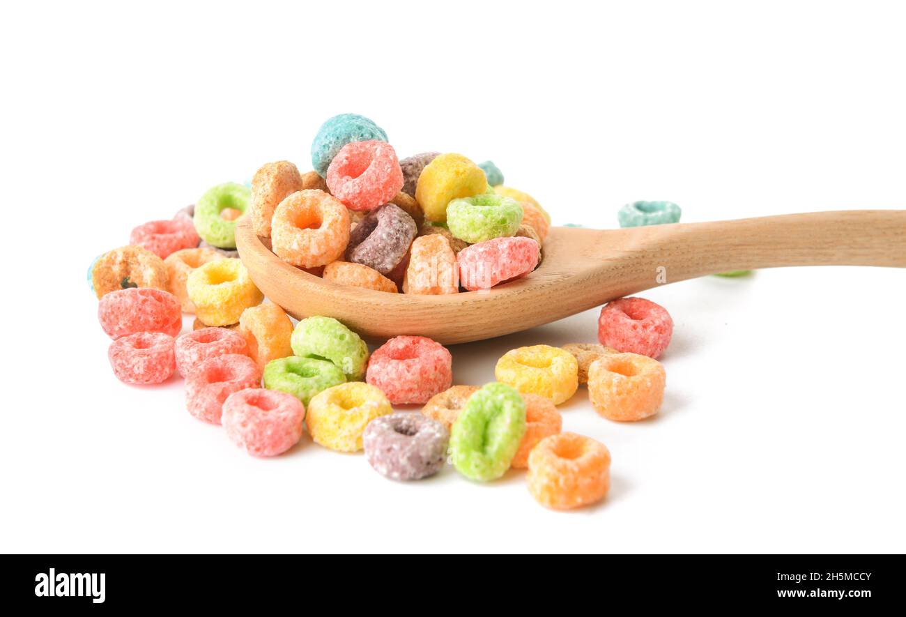 Spoon with crunchy corn flakes rings on white background Stock Photo ...