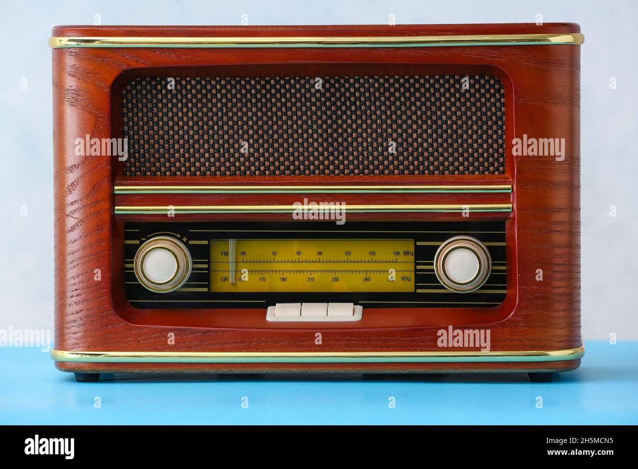 Retro radio receiver on light background Stock Photo - Alamy