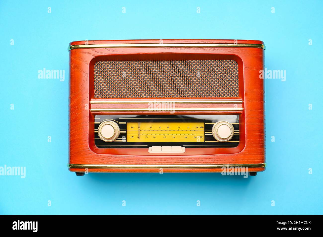 Vintage radio receiver on color background Stock Photo - Alamy