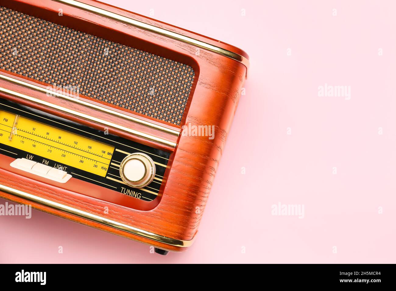 Vintage radio receiver on color background Stock Photo - Alamy