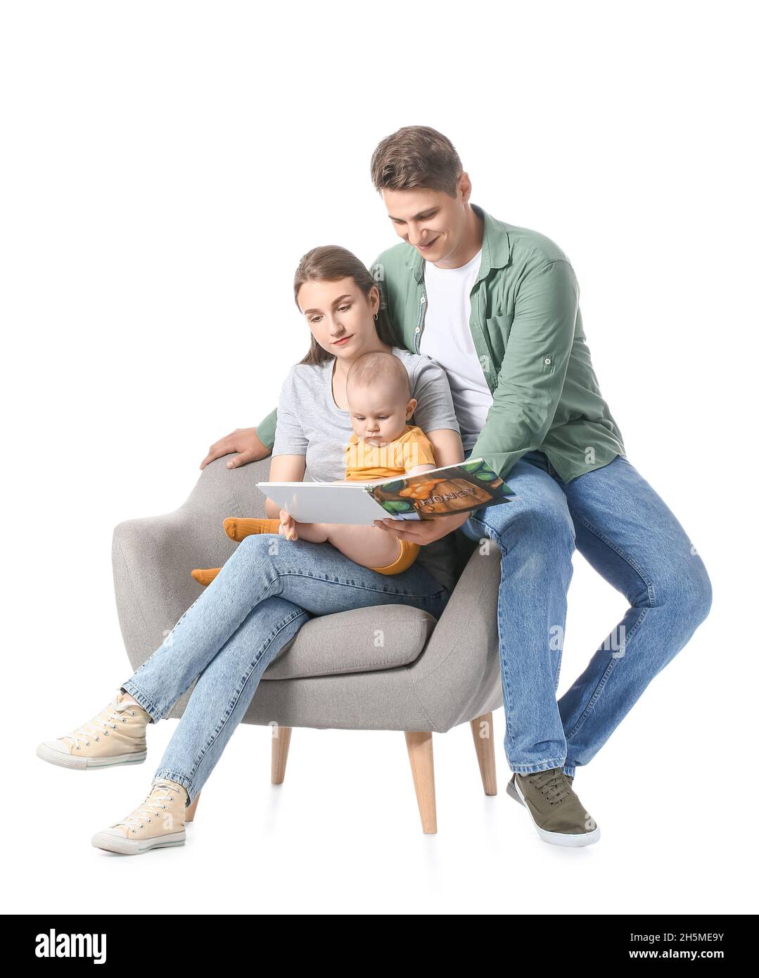 Little boy reading in armchair hi-res stock photography and images - Alamy