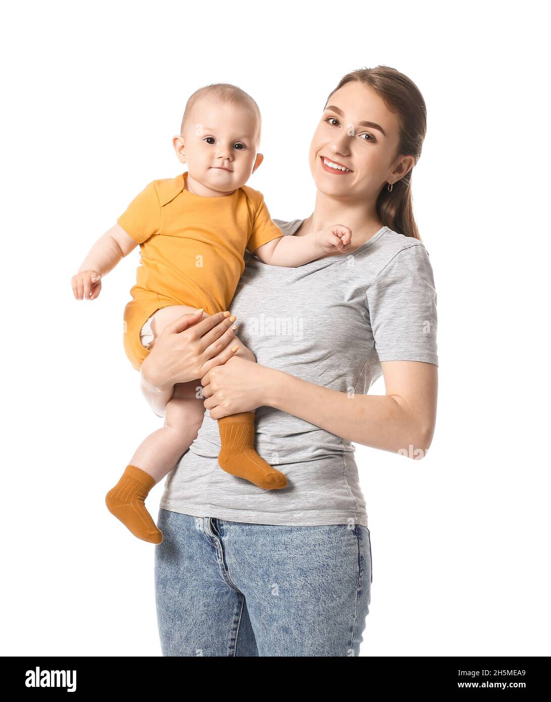 Young mother with little baby on white background Stock Photo - Alamy
