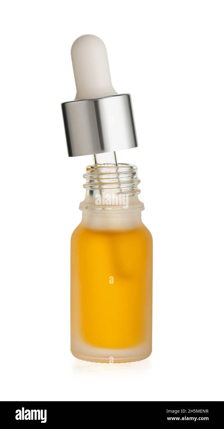 Bottle of essential oil with pipette on white background Stock Photo ...
