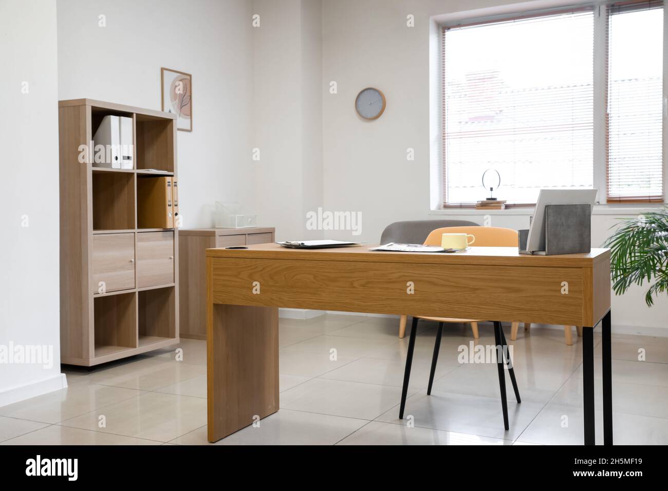 Stylish office workplace near window Stock Photo - Alamy