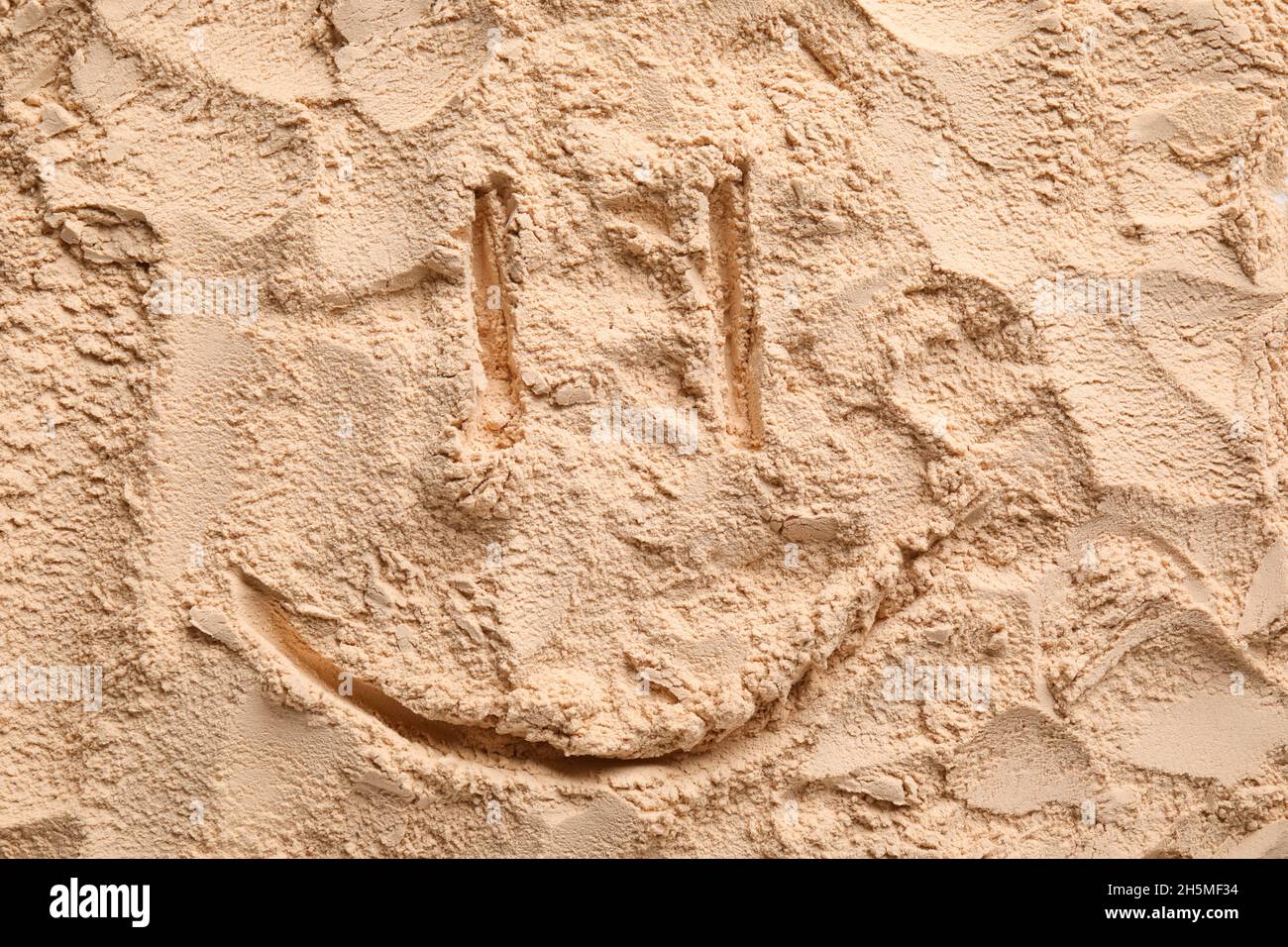 Smile drawing on protein powder Stock Photo - Alamy