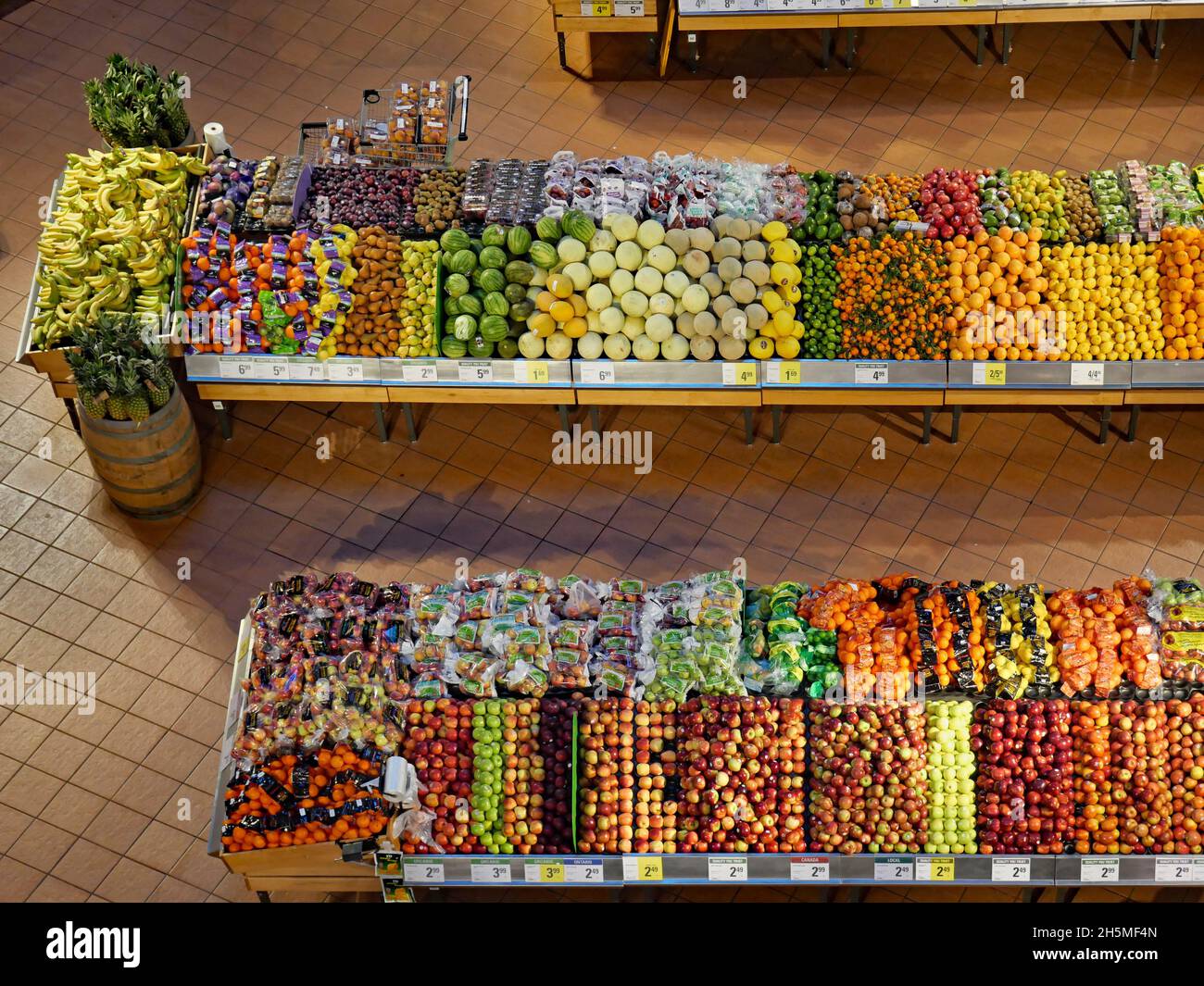 The fresh fruit and vegetable department of a large modern supermarket ...