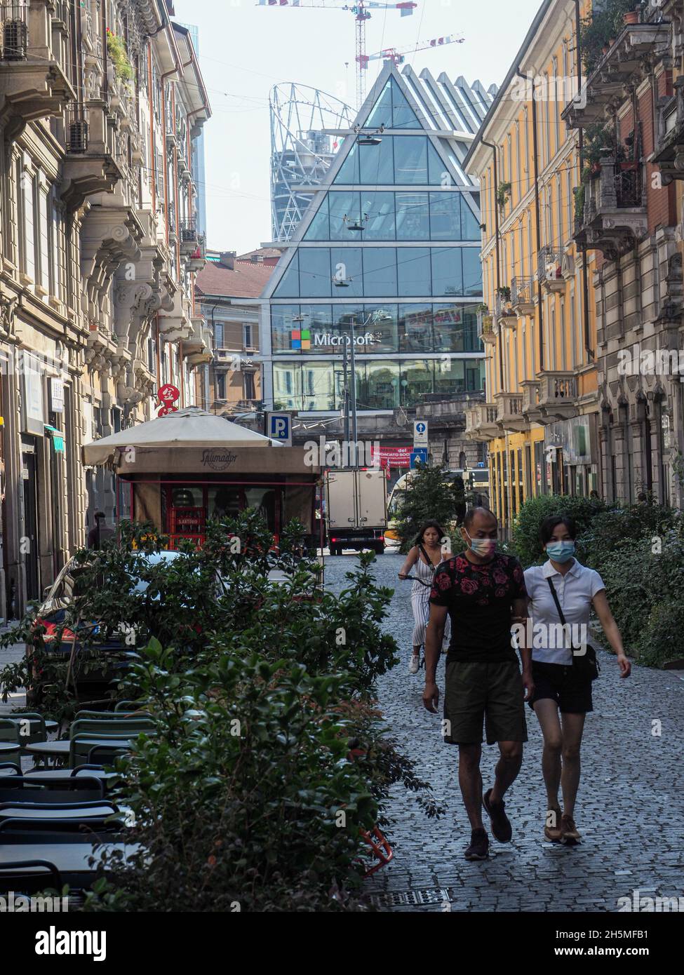 City of Milan people in the streest, electric transport and everyday ...