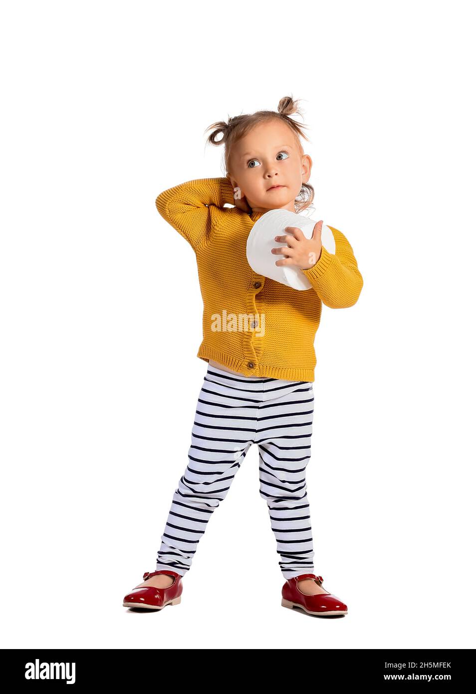 Cute baby girl with toilet paper on white background Stock Photo - Alamy