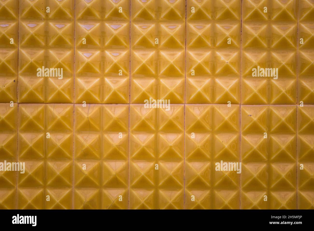 Yellow color ceramic texture detail of wall Stock Photo - Alamy