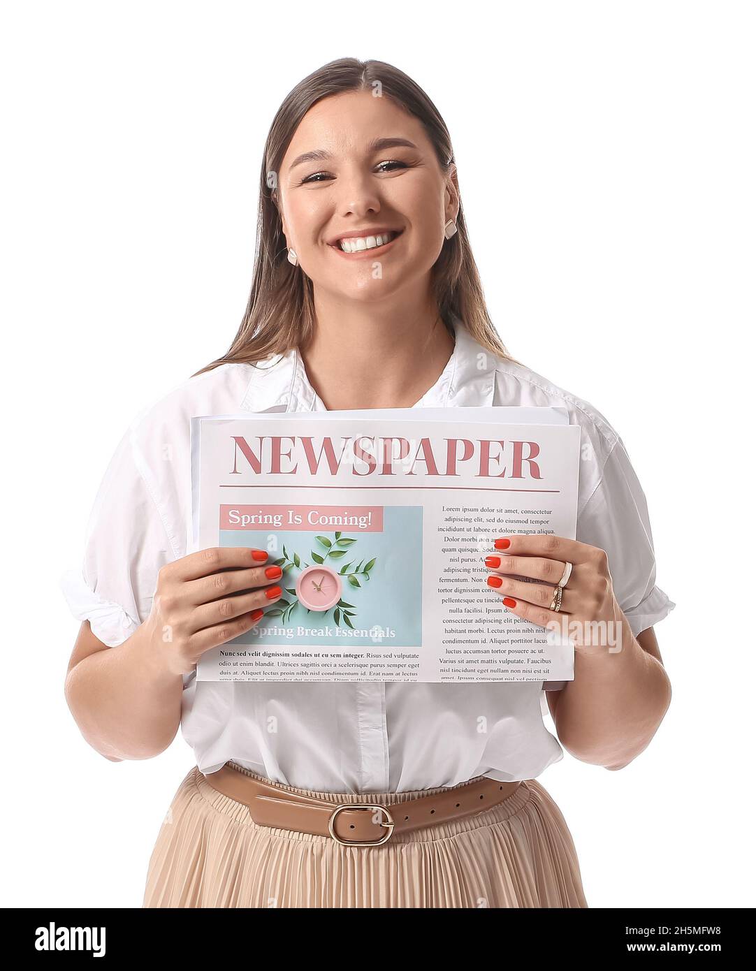 Smiling young woman with newspaper on white background Stock Photo - Alamy