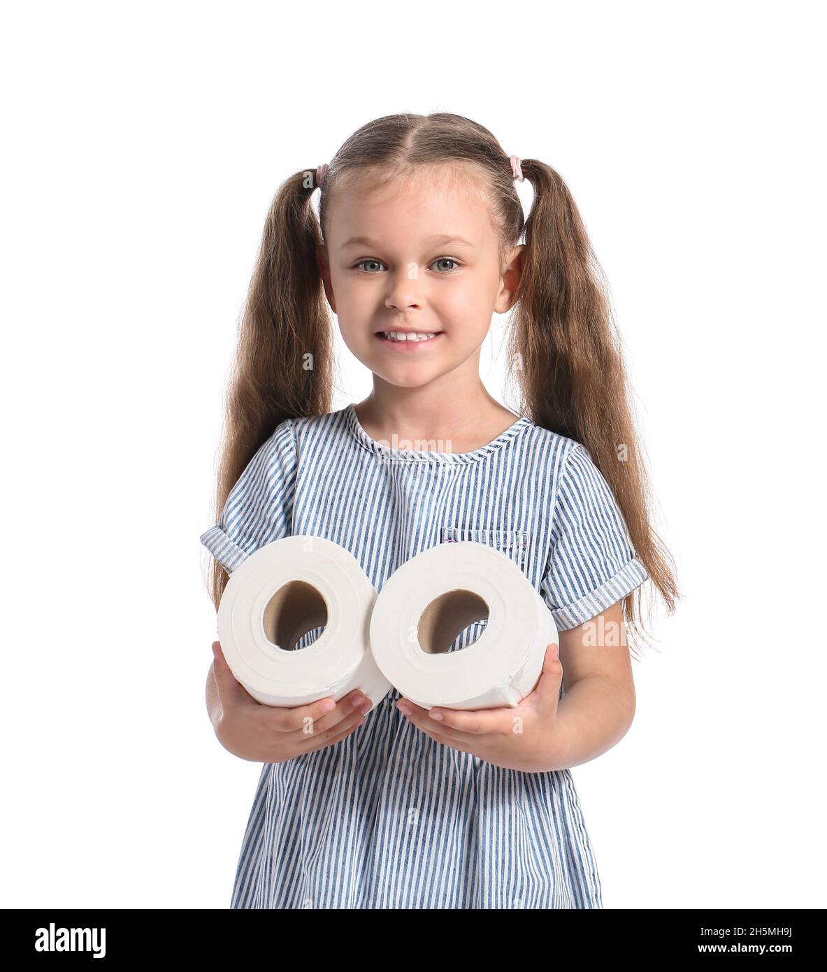 Little girl with toilet paper on white background Stock Photo - Alamy