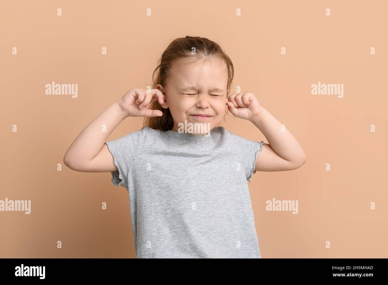 Plugging ears hi-res stock photography and images - Alamy