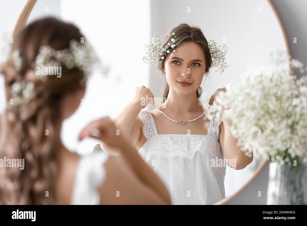 Beautiful young bride preparing for her wedding day Stock Photo - Alamy