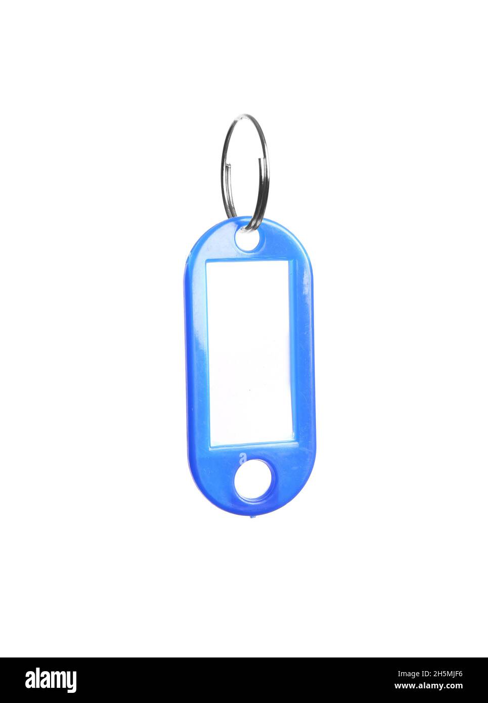 Plastic key tag on white background Stock Photo - Alamy