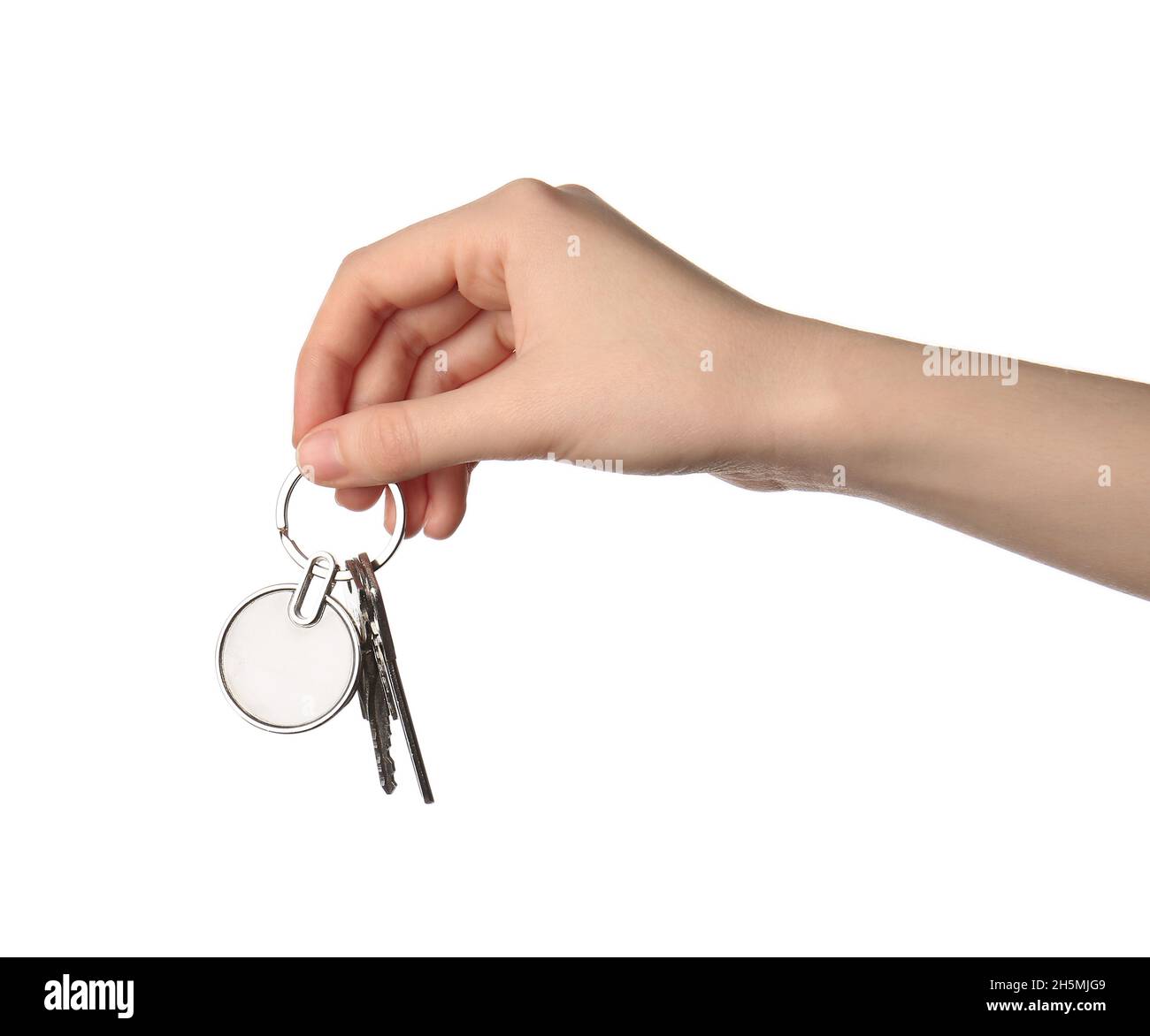 Female hand holding keys with keychain on white background Stock Photo ...