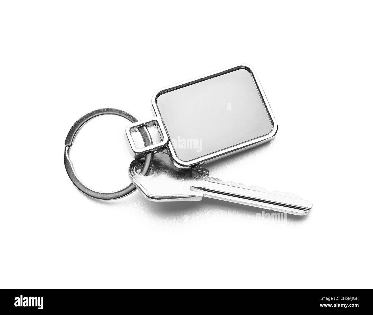 Stylish square keychain with key on white background Stock Photo - Alamy