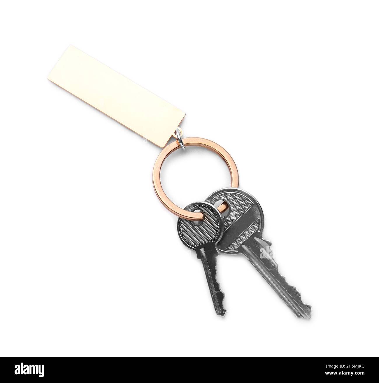 Stylish keychain with keys on white background Stock Photo - Alamy