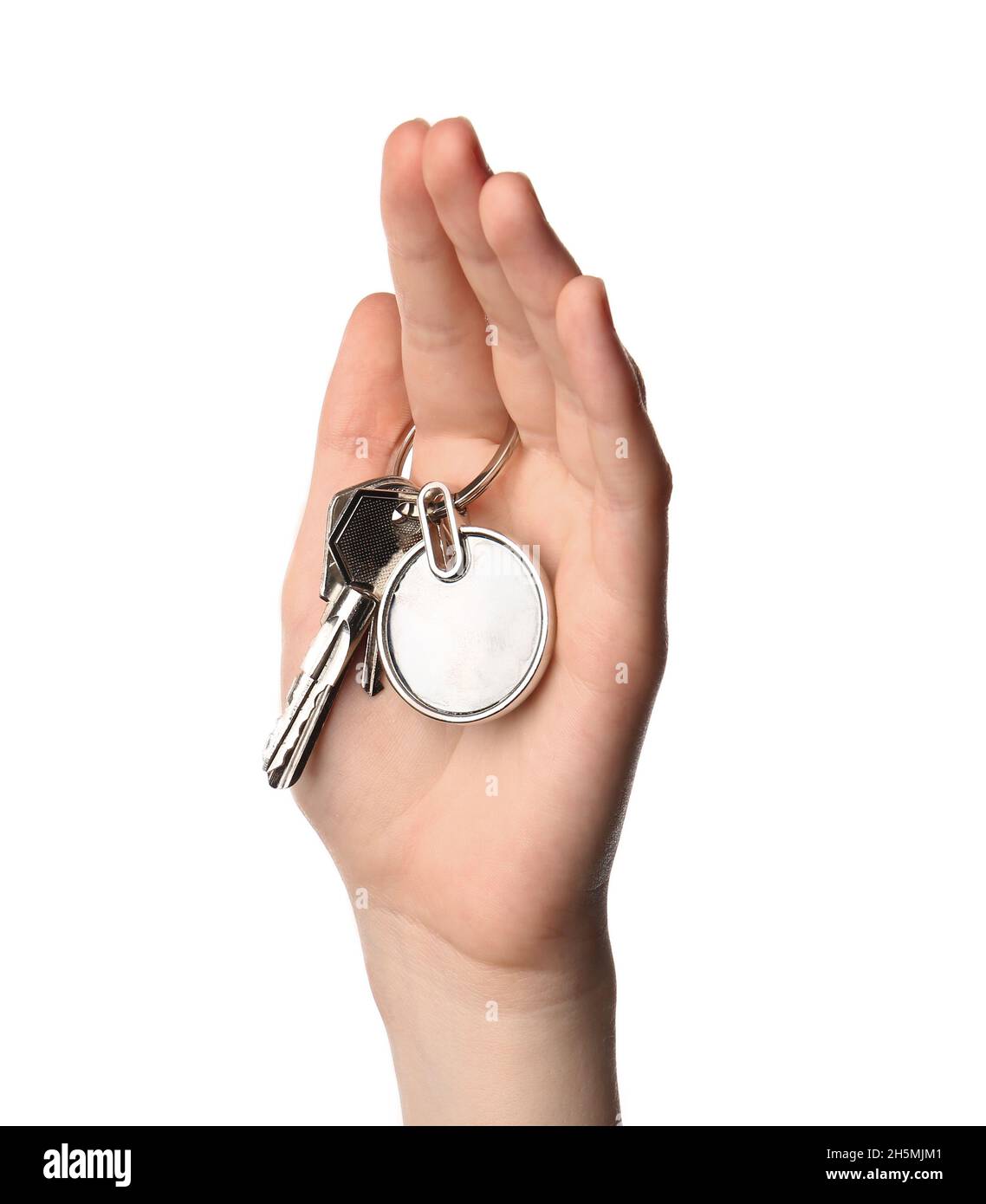 Female hand holding keys with round keychain on white background Stock ...