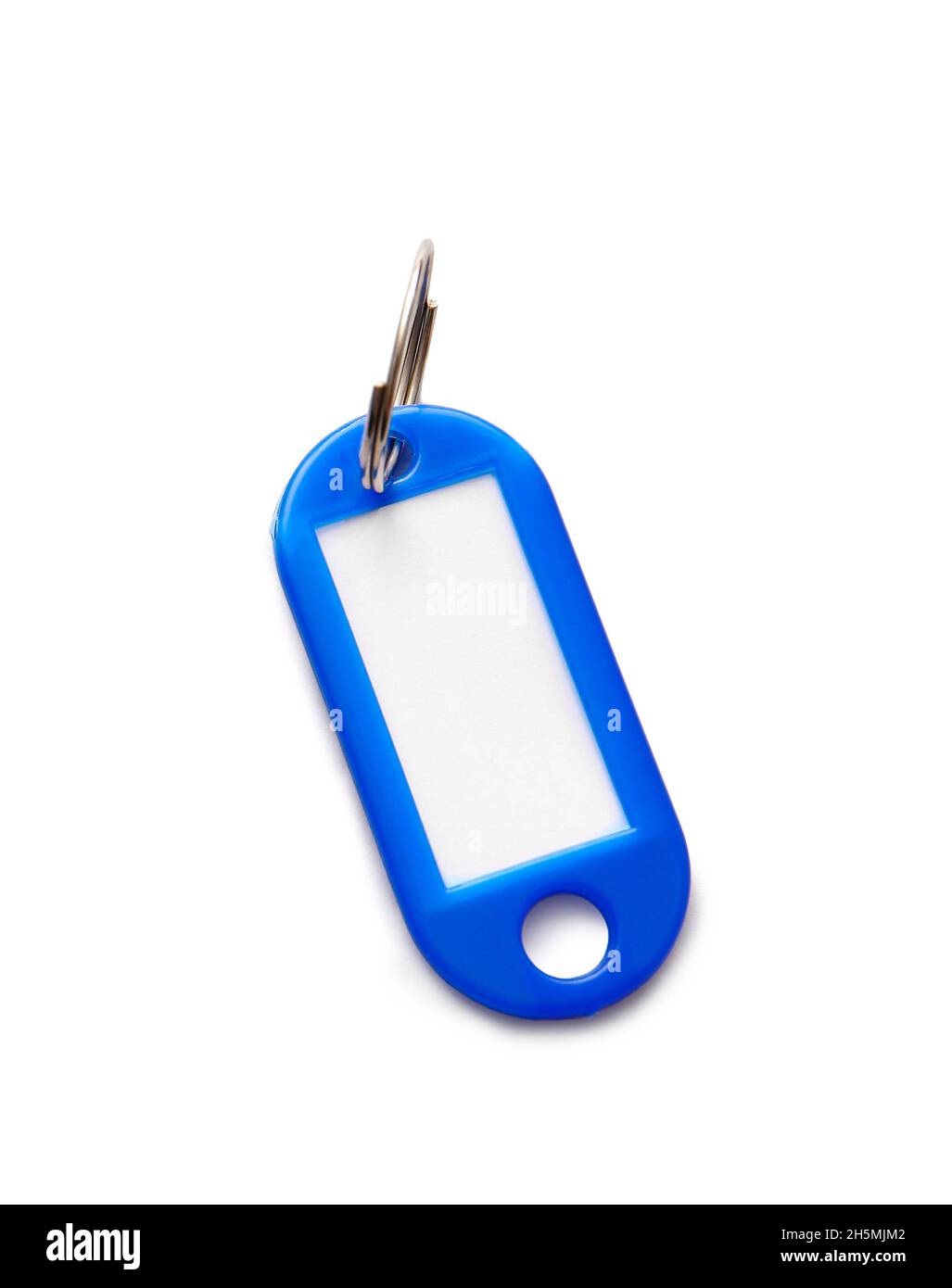 Plastic key tag on white background Stock Photo - Alamy