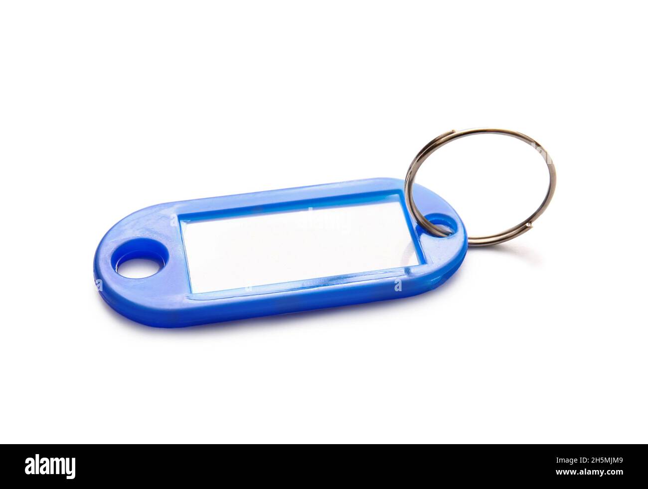 Plastic key tag on white background Stock Photo - Alamy