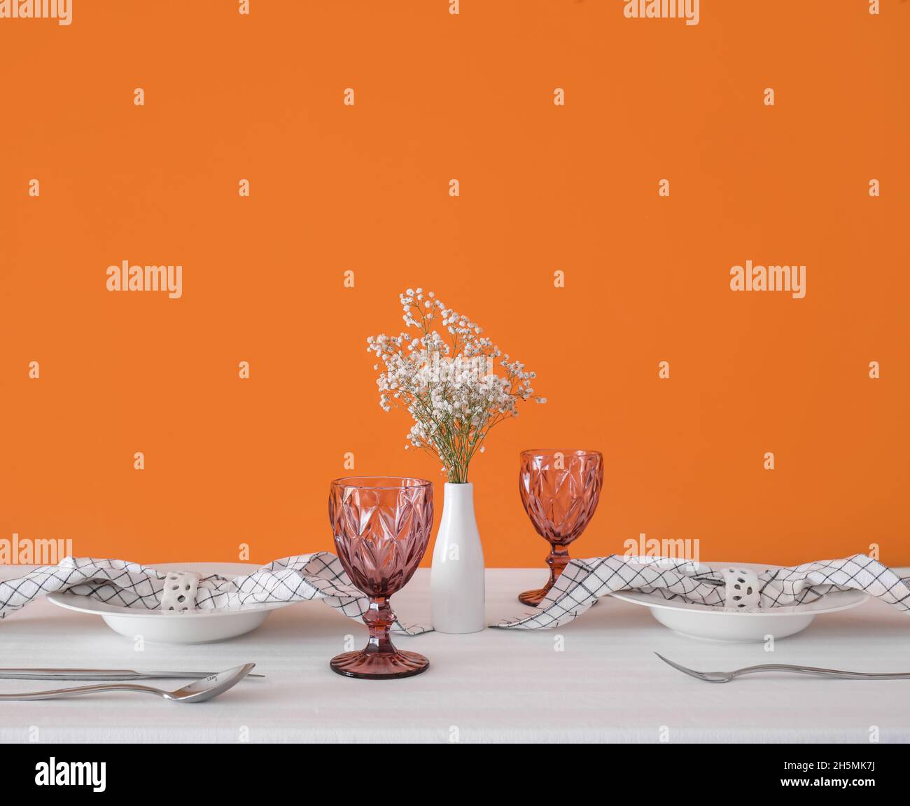 Stylish table setting in dining room Stock Photo - Alamy