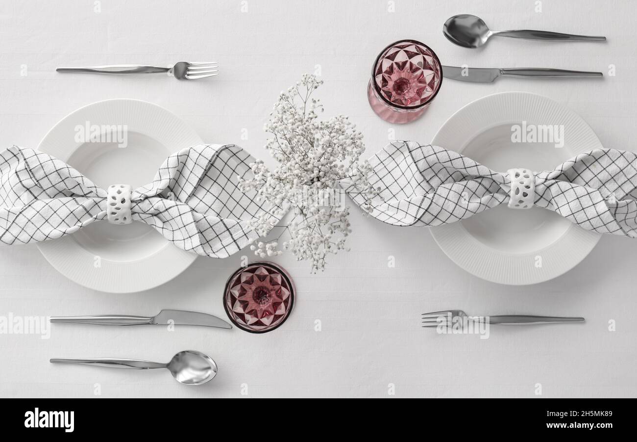 Stylish table setting in dining room Stock Photo - Alamy