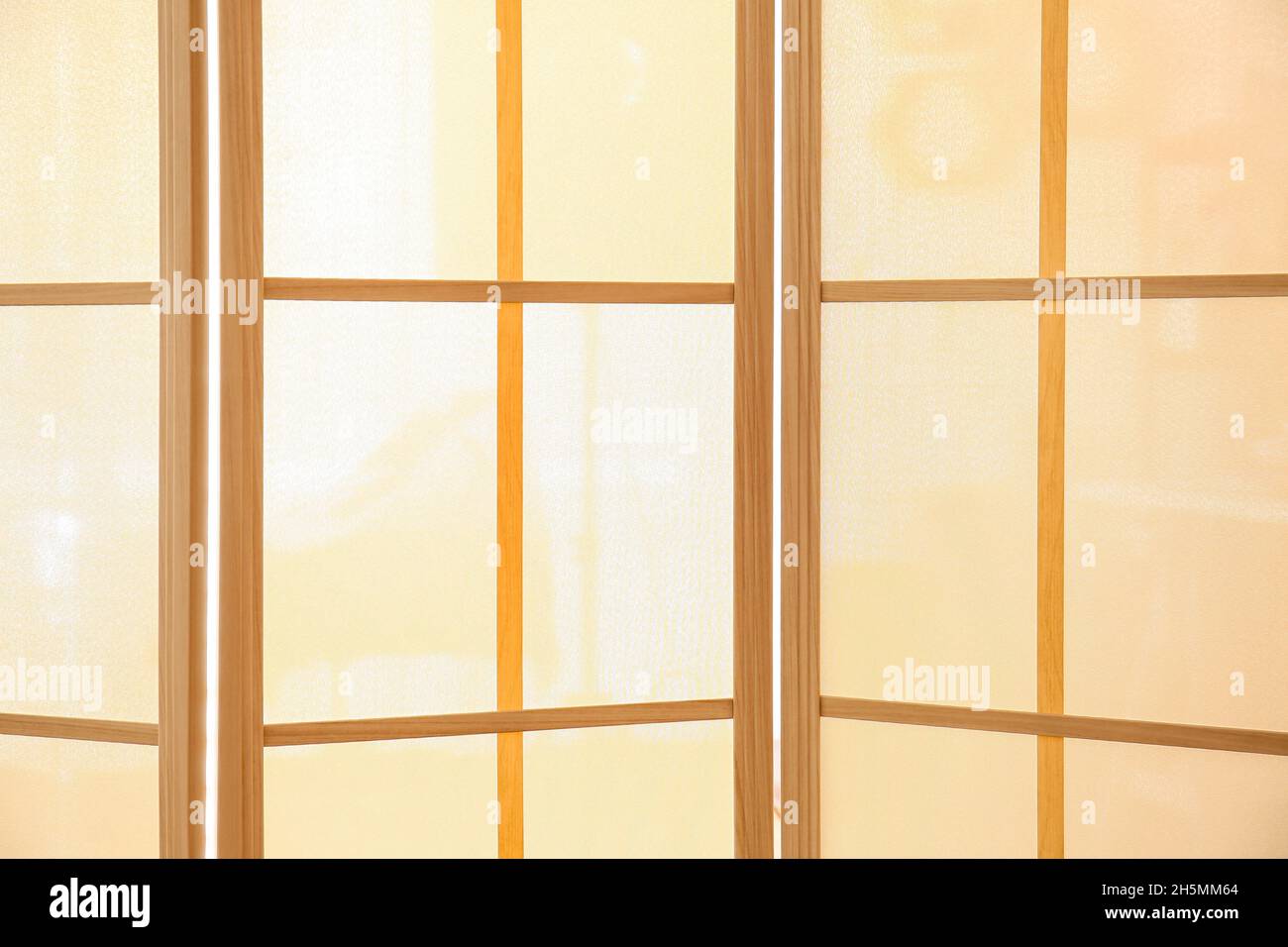 Modern beige folding screen, closeup Stock Photo - Alamy