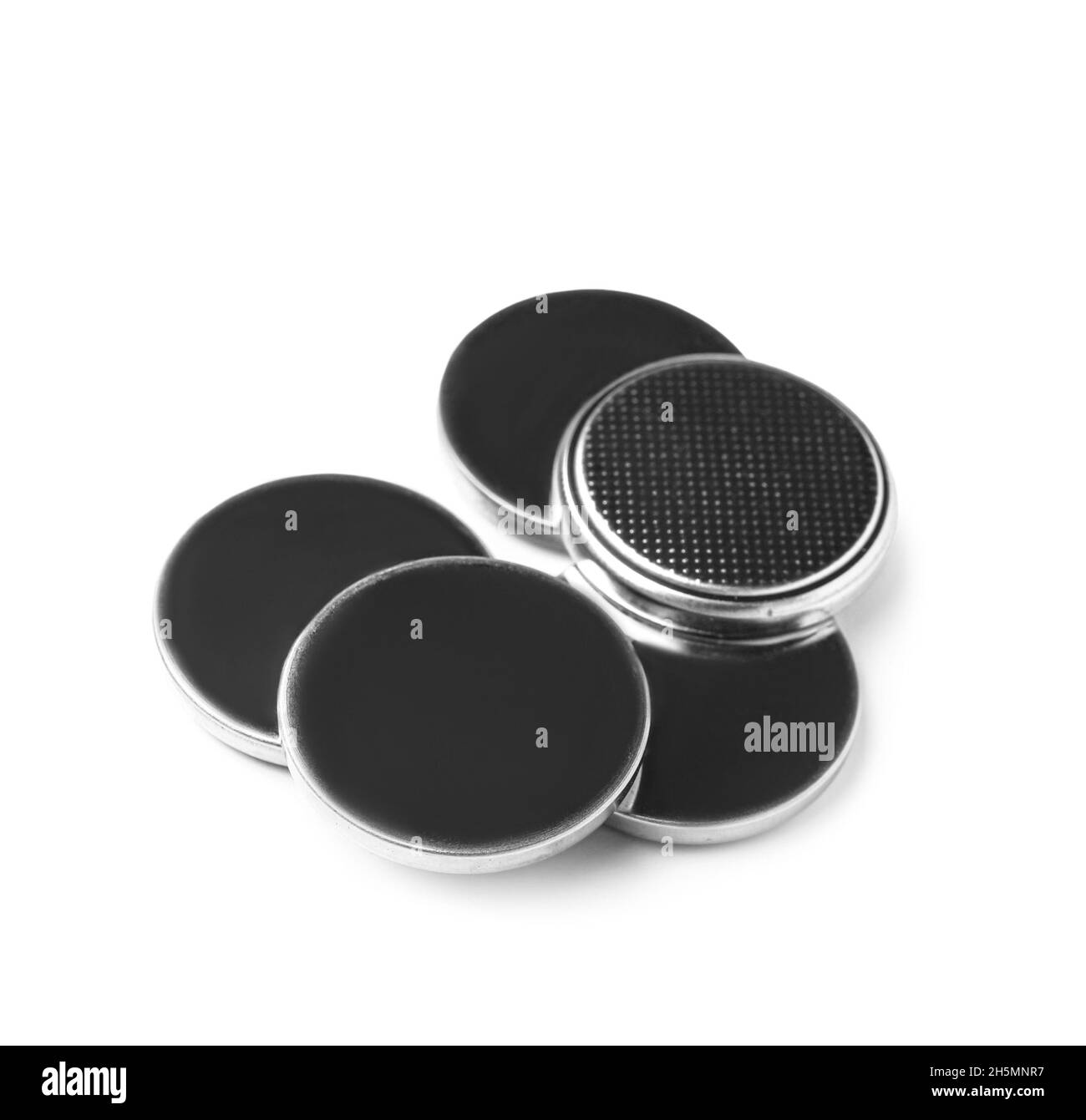 Lithium button cell batteries on white background Stock Photo - Alamy