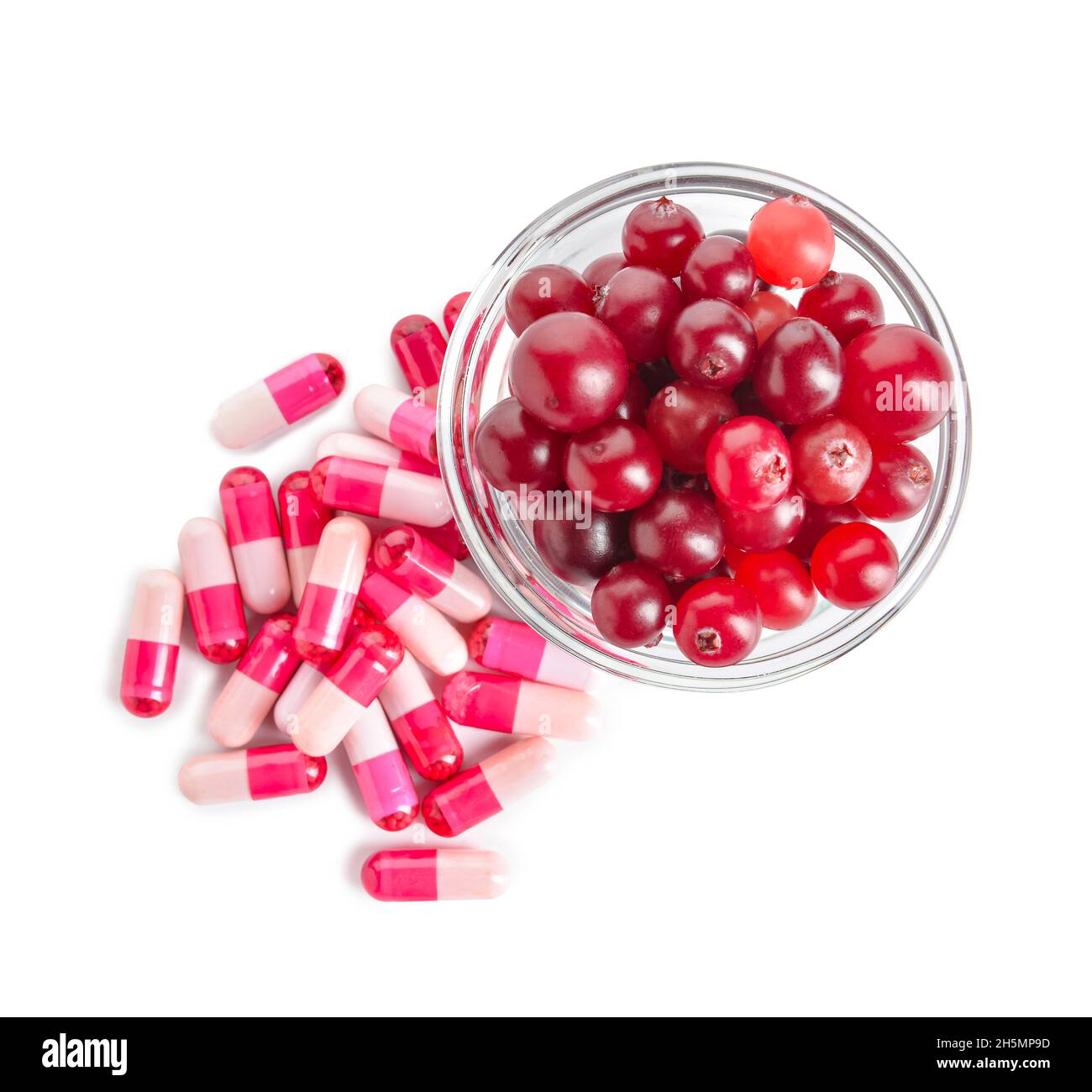 Cranberry pills and bowl of berries isolated on white background Stock ...