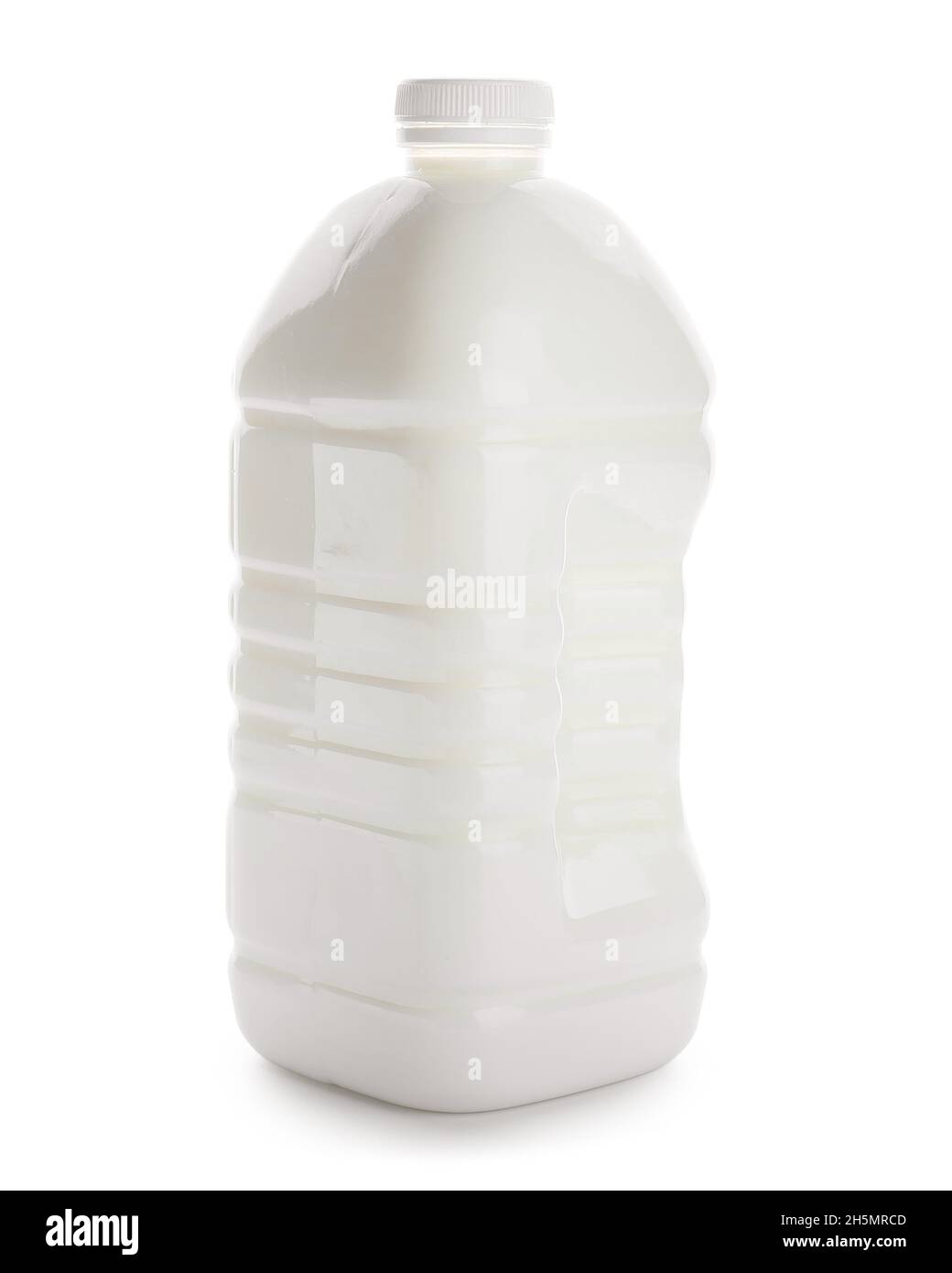 Gallon container of milk on white background Stock Photo - Alamy