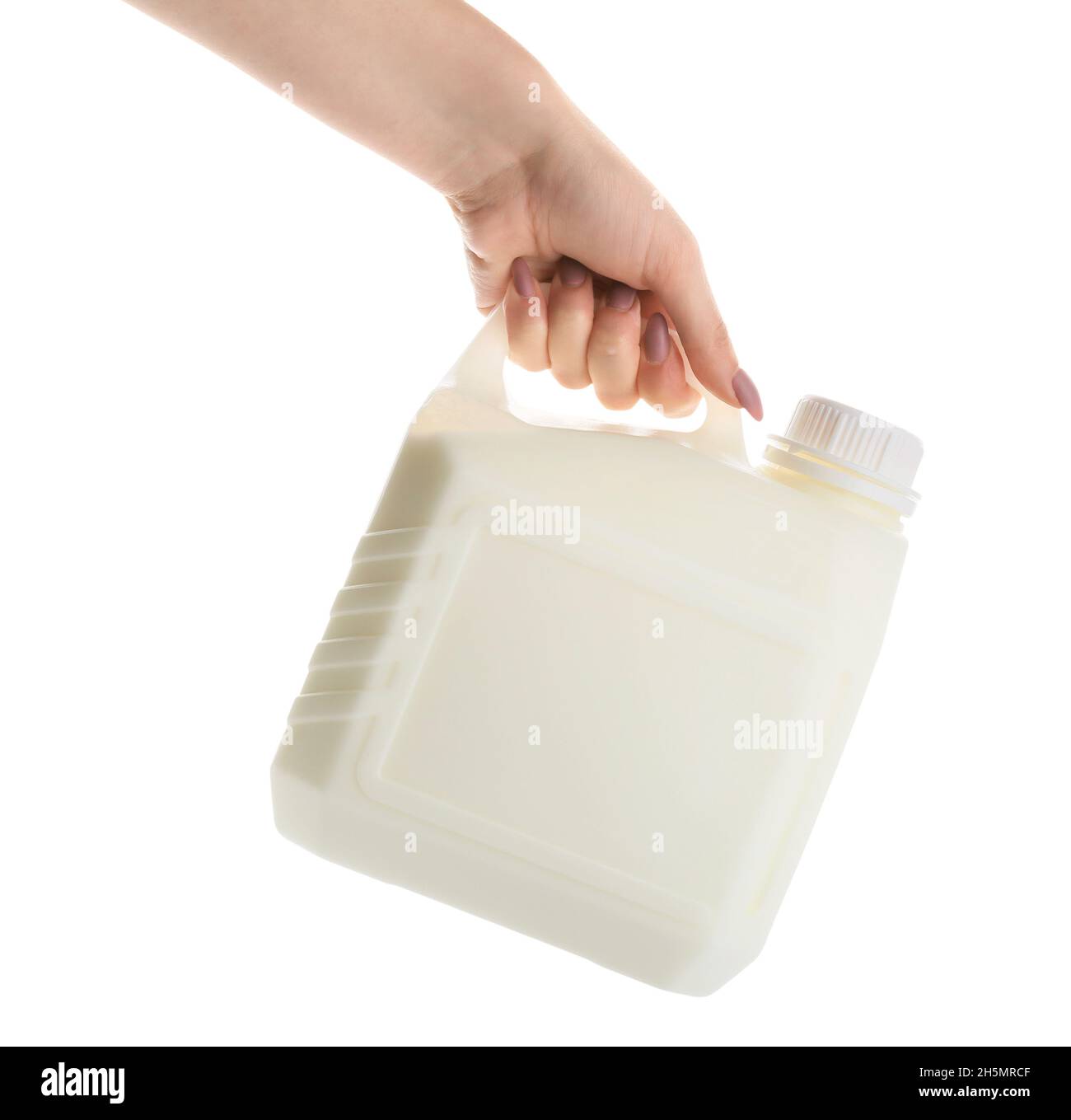 Female hand with gallon bottle of milk on white background Stock Photo ...