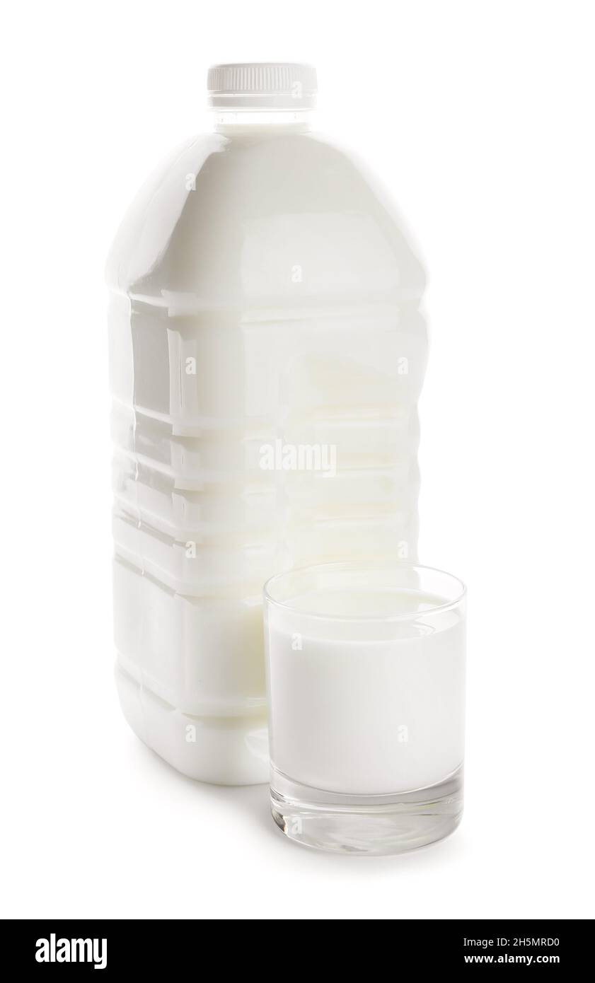 Gallon bottle and glass of milk on white background Stock Photo - Alamy