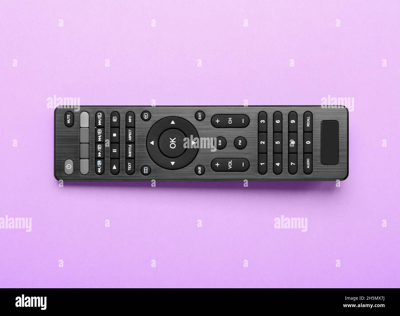 Modern TV remote control on color background Stock Photo - Alamy