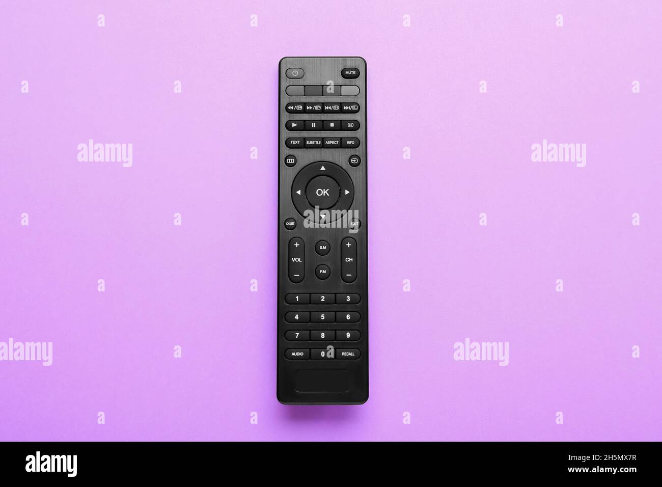 Modern TV remote control on color background Stock Photo - Alamy